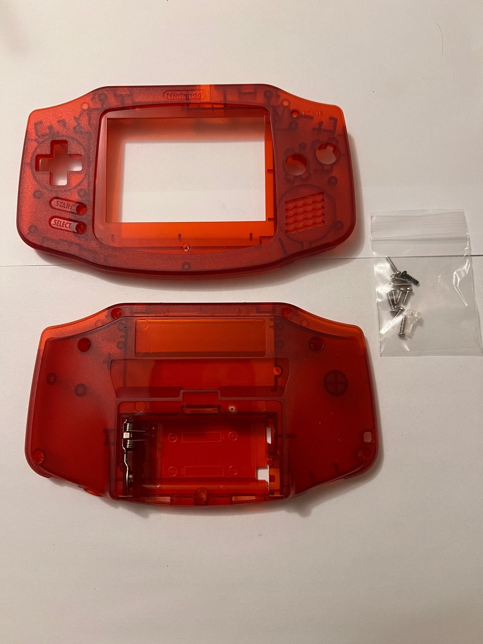 Game boy advance shell clear red - incomplete no battery cover opened