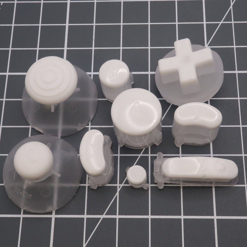 Custom resin buttons for GameCube - Pudding caps | Lab Fifteen Co